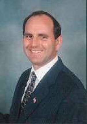 Former trustee failed to disclose financial interests