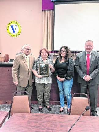 Council honors Koumaras, Distasi