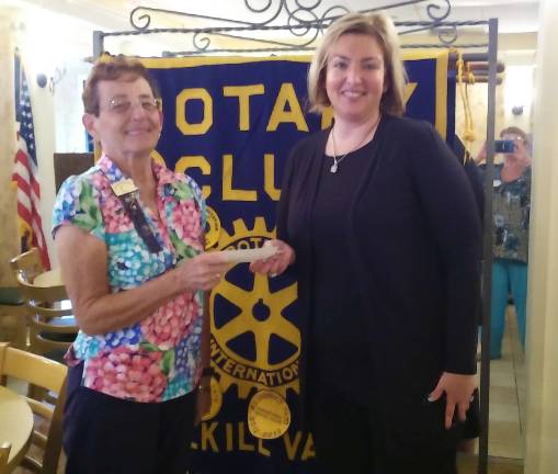 Rotary Club donates to hurricane victims
