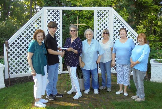 Church presents student with scholarship